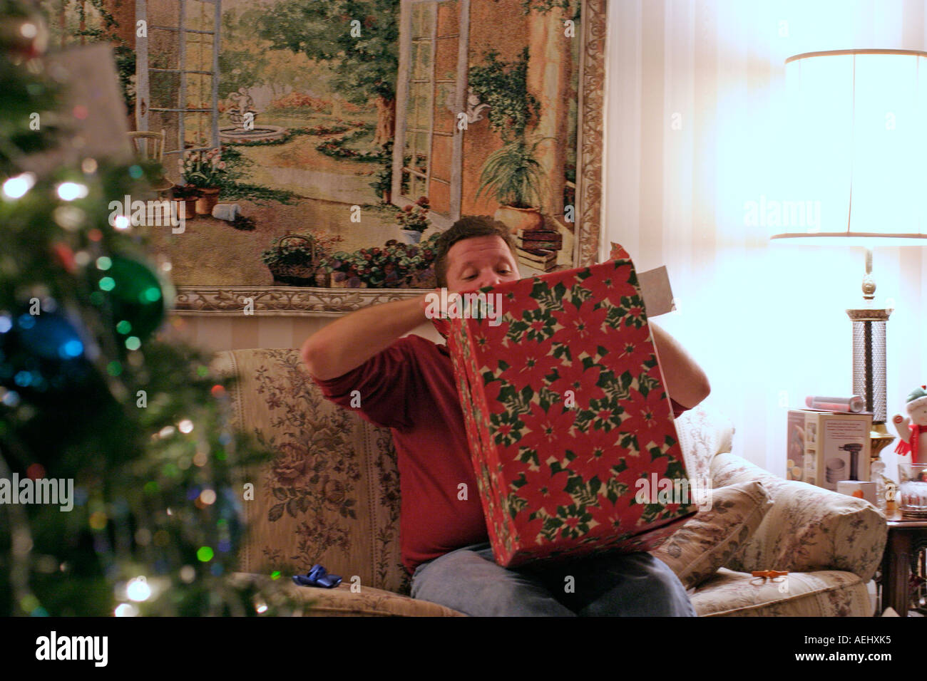 Rip open gifts hi-res stock photography and images - Alamy