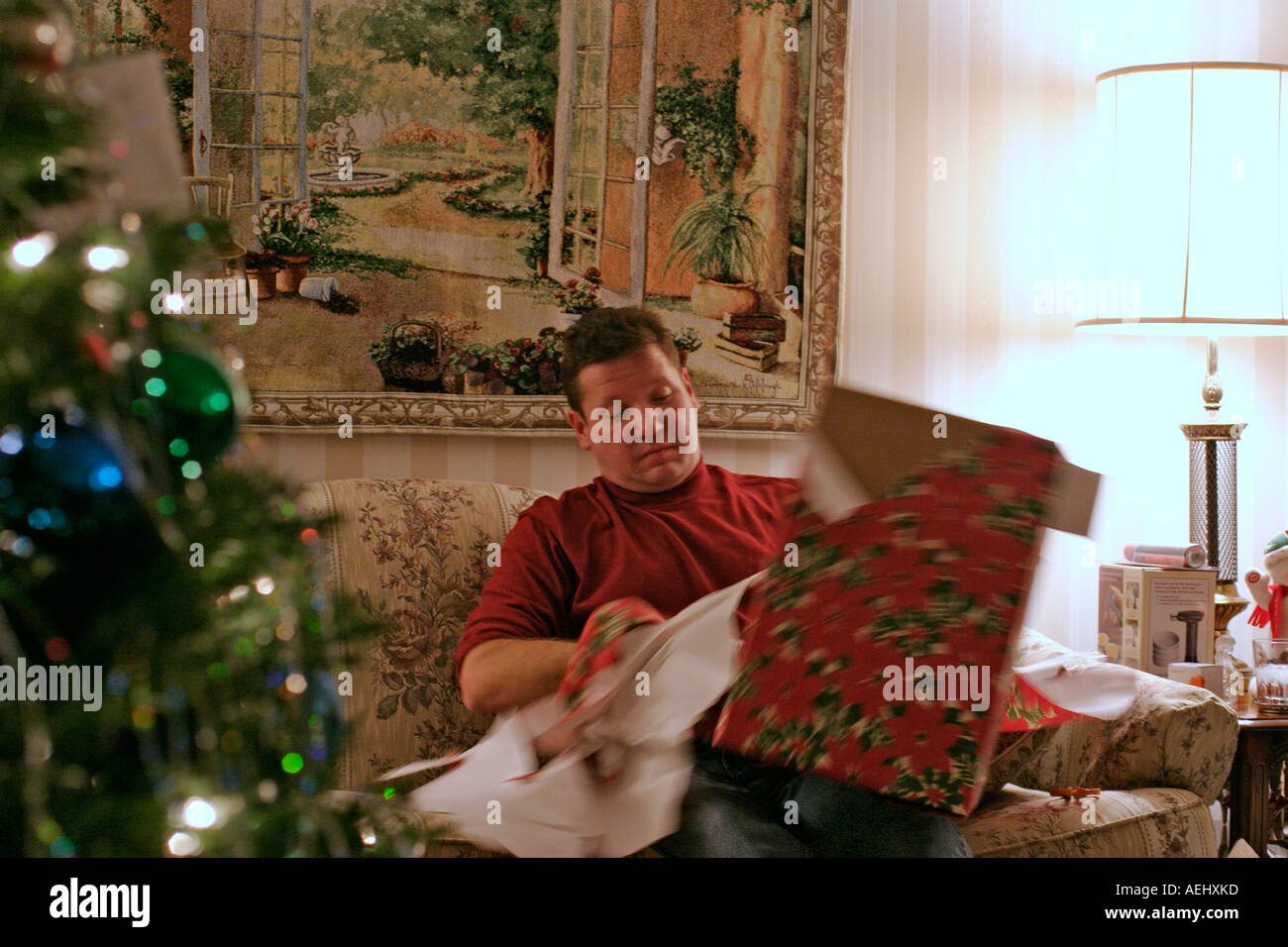 Rip open gifts hi-res stock photography and images - Alamy