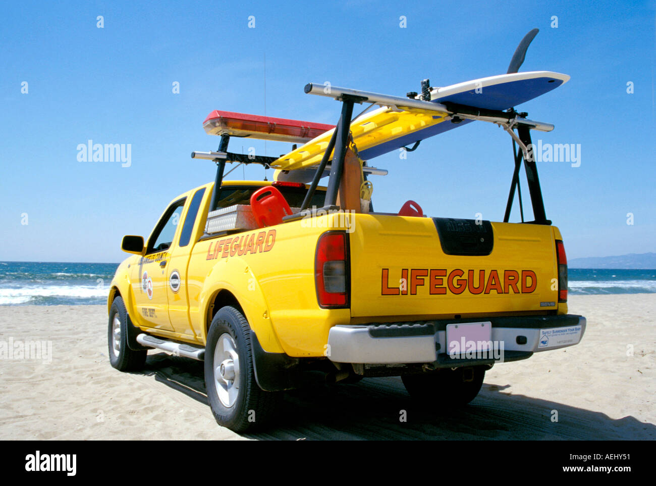 Lifeguard truck on beach Stock Photo - Alamy