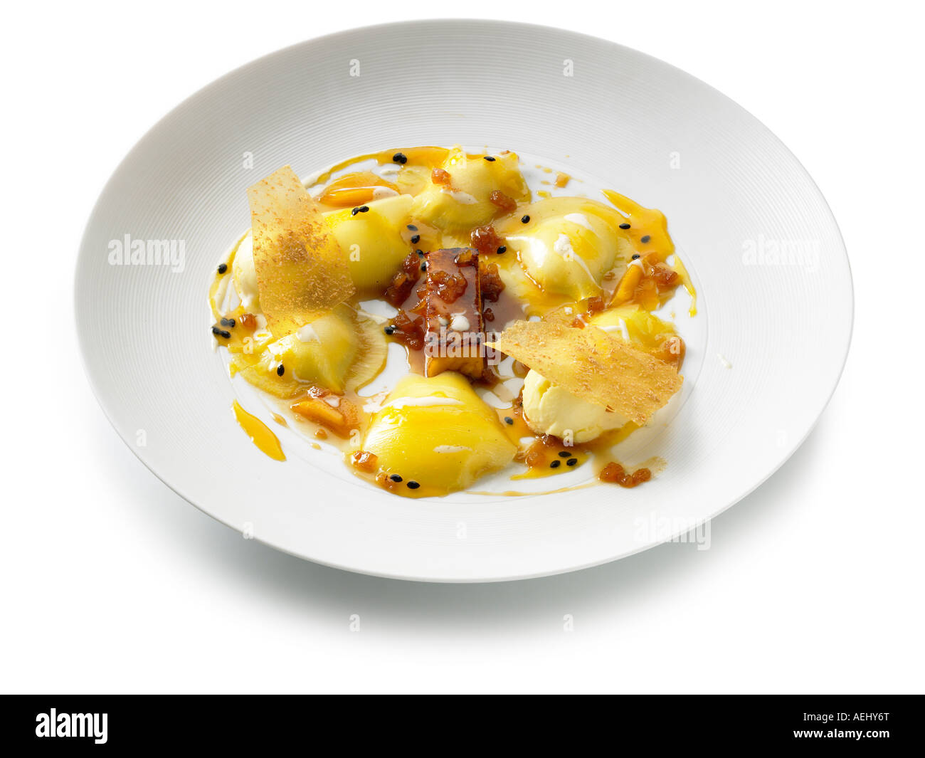 Poached and roasted pineapple with passion fruit sauce and pinapple ...