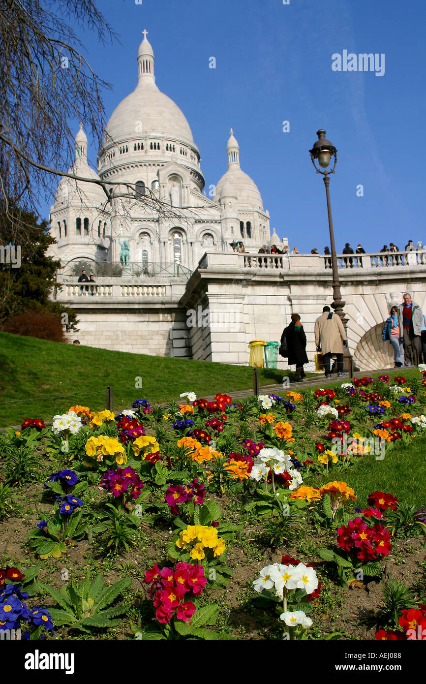 The Sacre-Coeur church at Montmartre in Paris France with flowers in ...