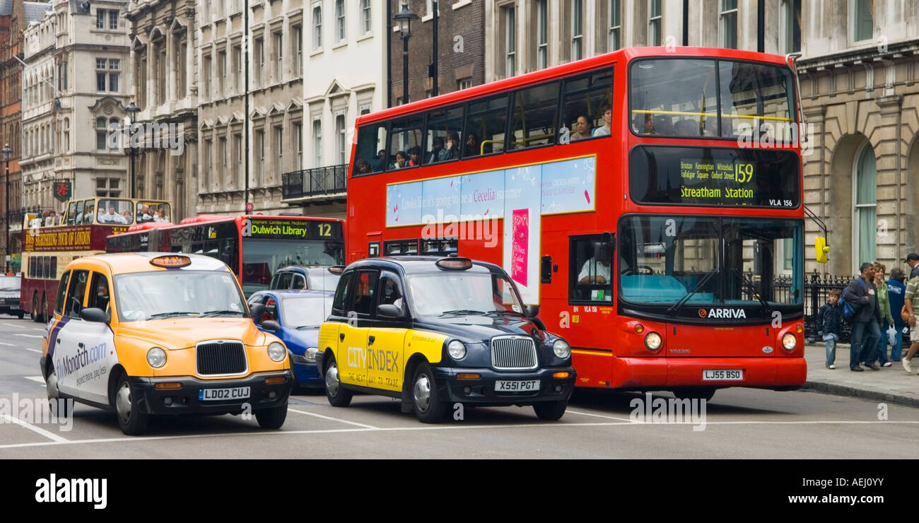Double Decker bus and Black Cab in London Westminster England UK Stock ...