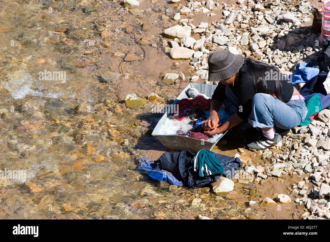 A woman washing the clothes in a river in Yavi Provincia de Jujuy ...