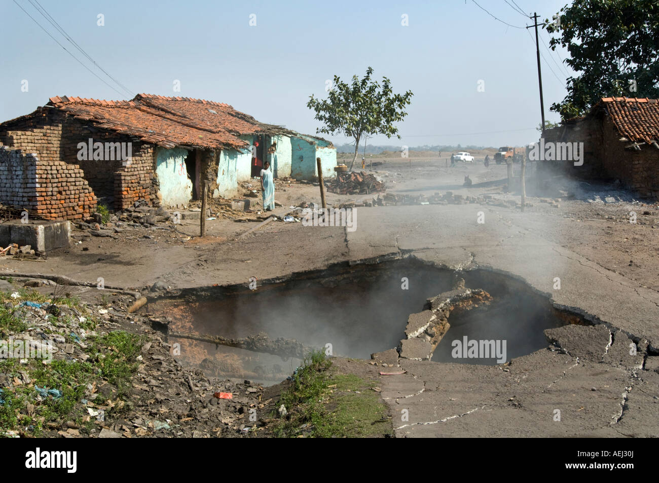 Fires inside the coal mines make the ground subside destroying houses ...