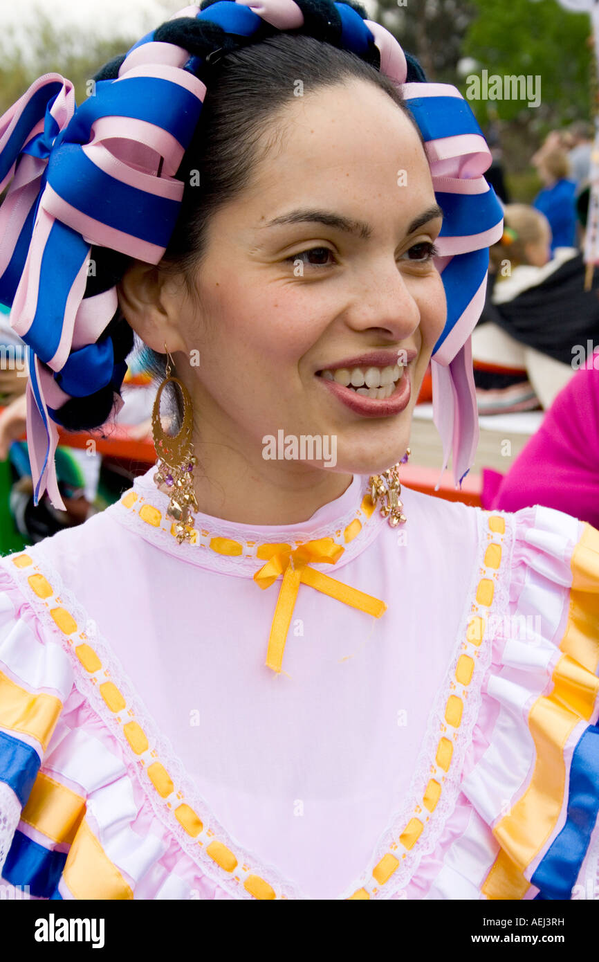 Chicana woman age 23 wearing Mexican parade dress. Cinco de Mayo Fiesta ...