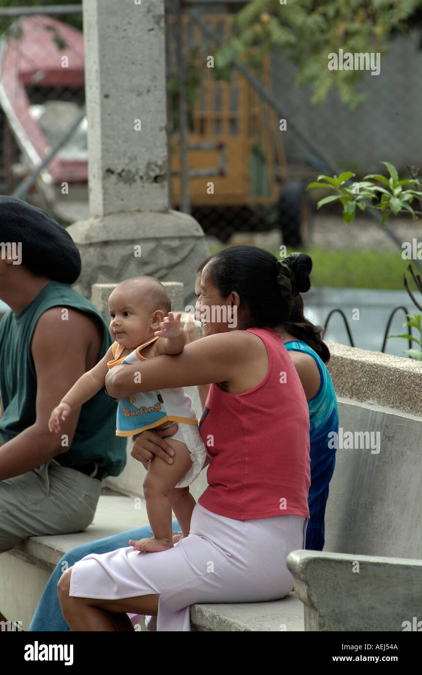 Costa Rican woman and his child on a bench, Costa Rica Stock Photo - Alamy