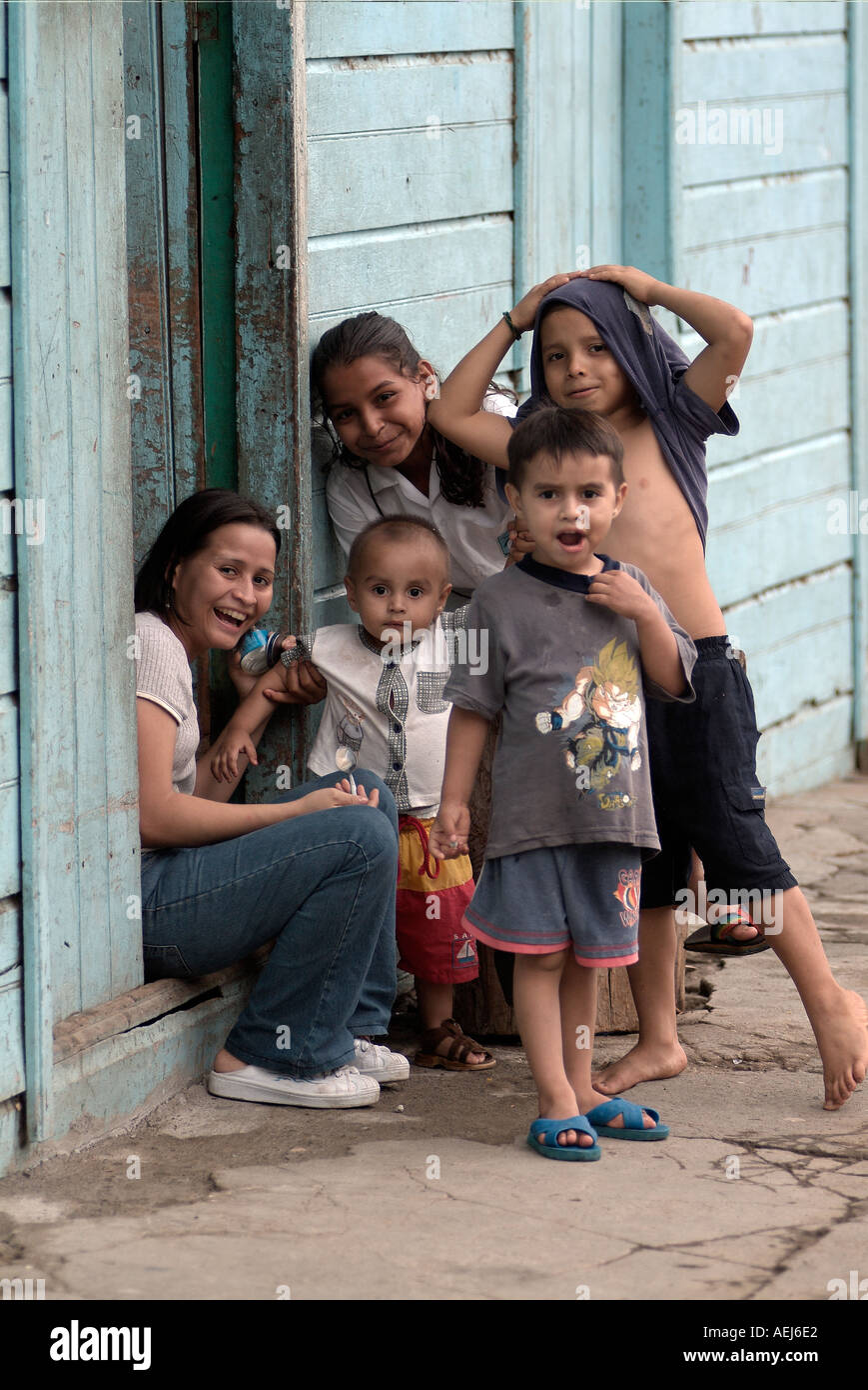 Costa Rican family in front of their house Stock Photo - Alamy
