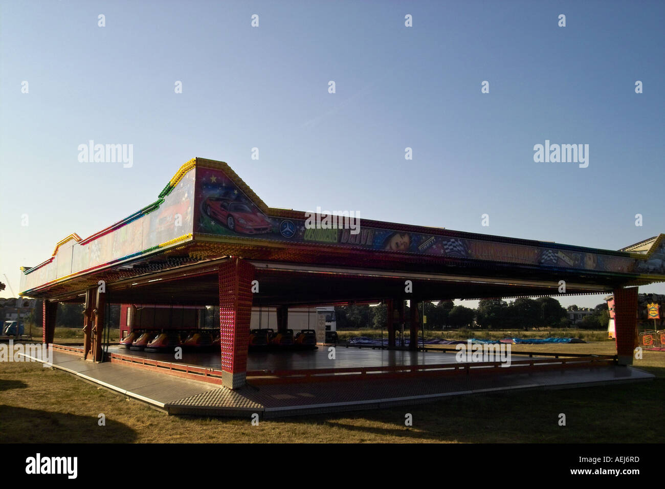 Open deserted dodgem stand at empty fun fair Stock Photo - Alamy