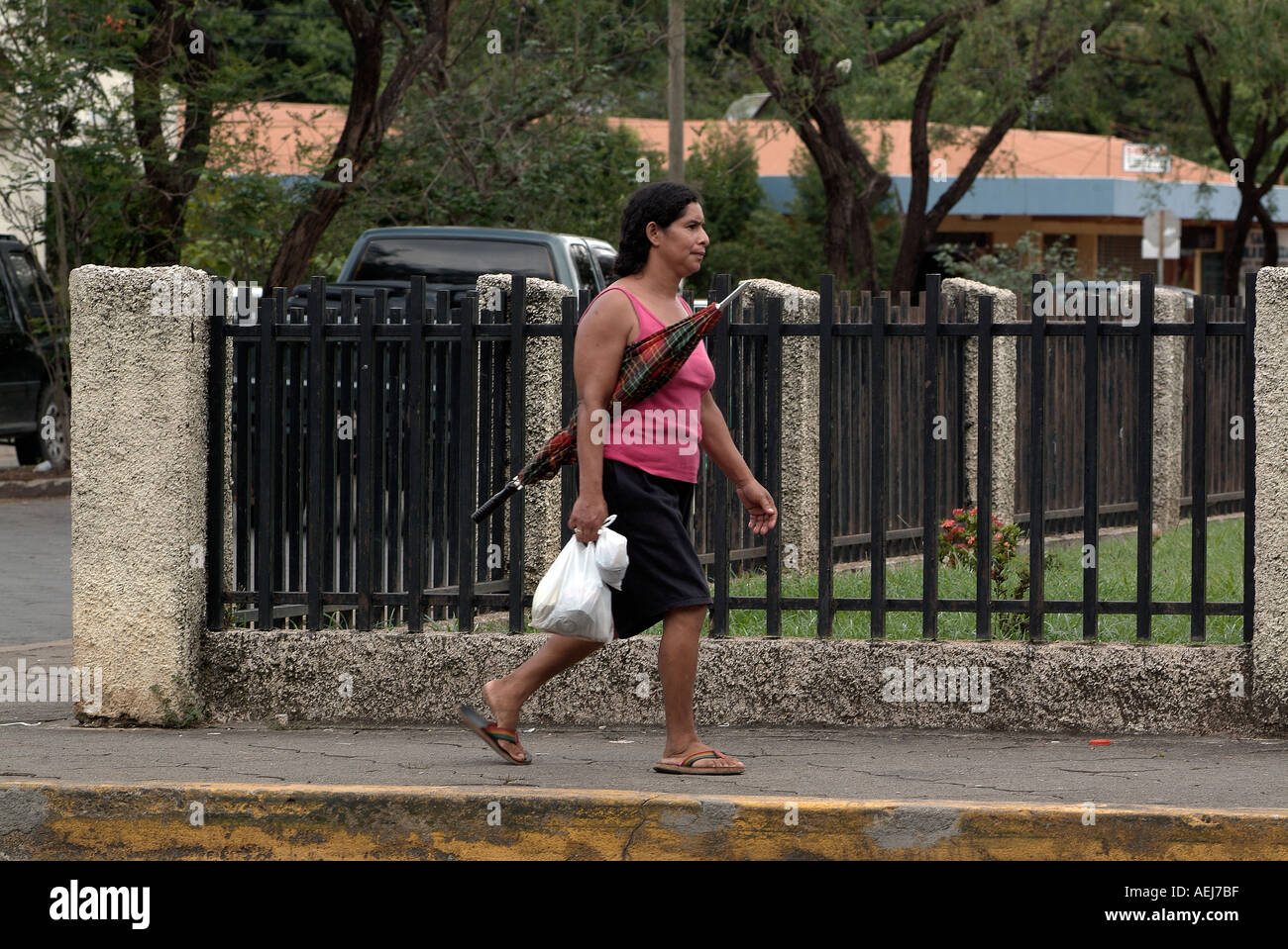 Costa Rican woman walking in the street, Costa Rica Stock Photo - Alamy
