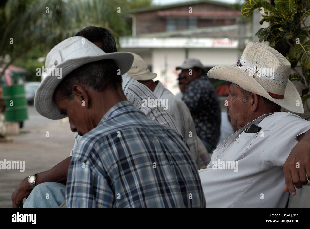 Costa Rican people sitting and talking on a bench, Costa Rica Stock ...