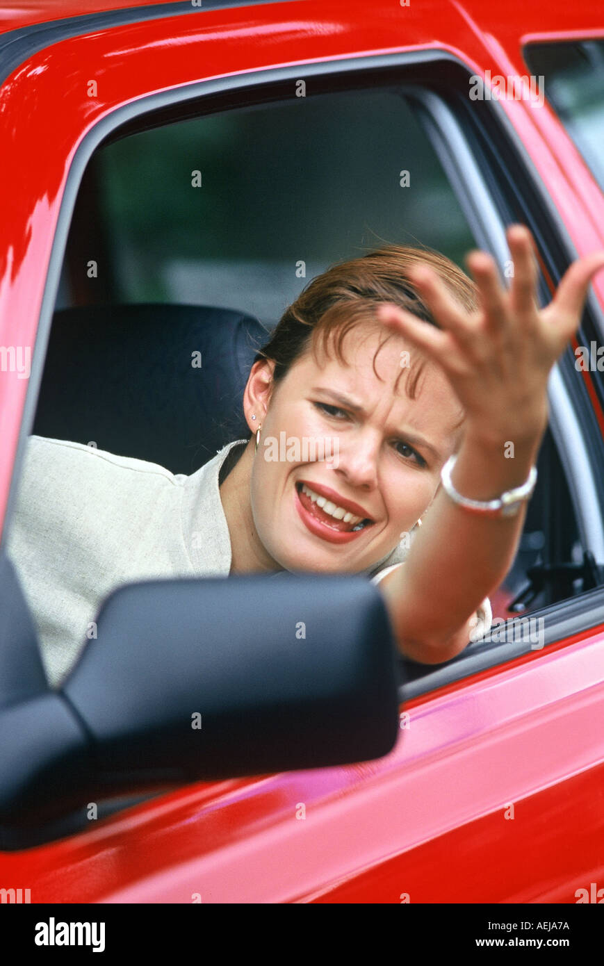 Stressed woman driving Stock Photo - Alamy