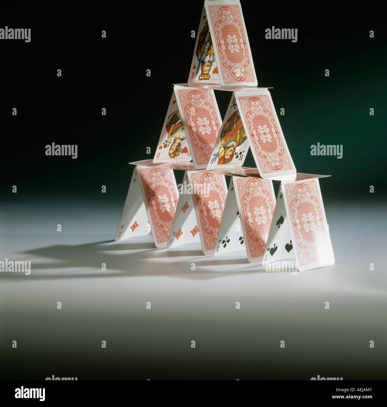 House cards triangle pyramid balance hi-res stock photography and ...