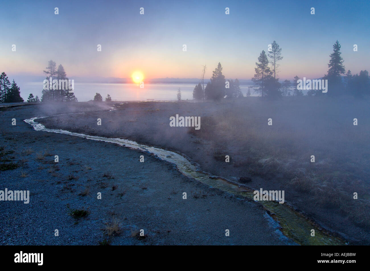 Morning fog at Yellowstone Lake, Yellowstone National Park, Wyoming ...