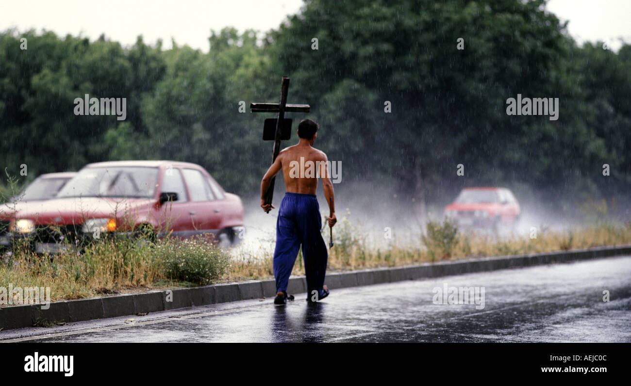 crazy walking man rain Stock Photo - Alamy