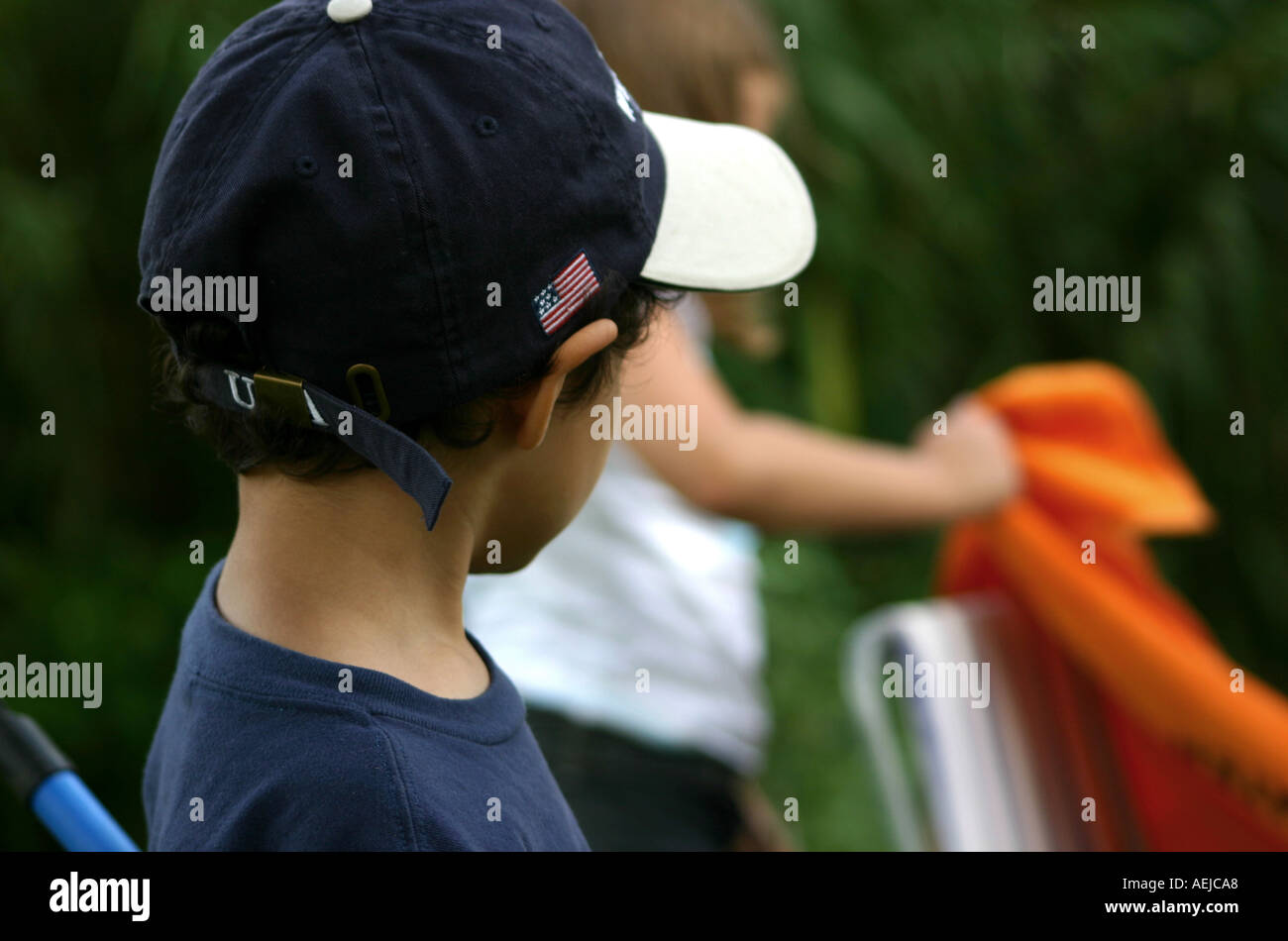 Boy with cap Stock Photo - Alamy