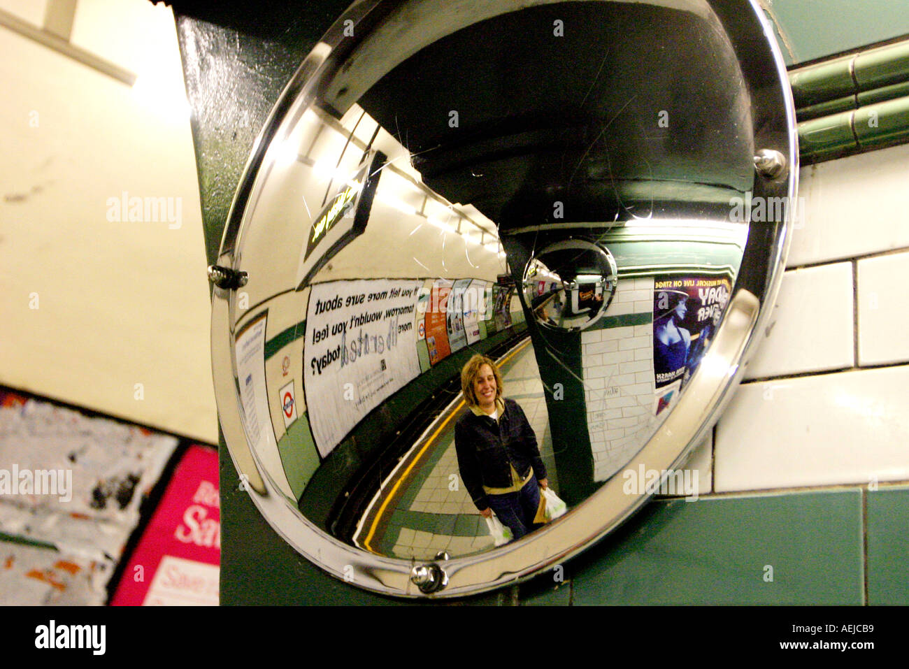 round mirror in underground station Stock Photo - Alamy