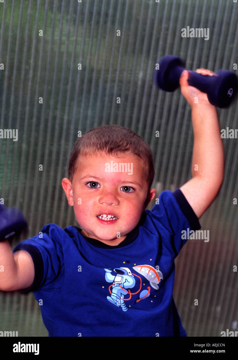 boy lifting weights Stock Photo - Alamy