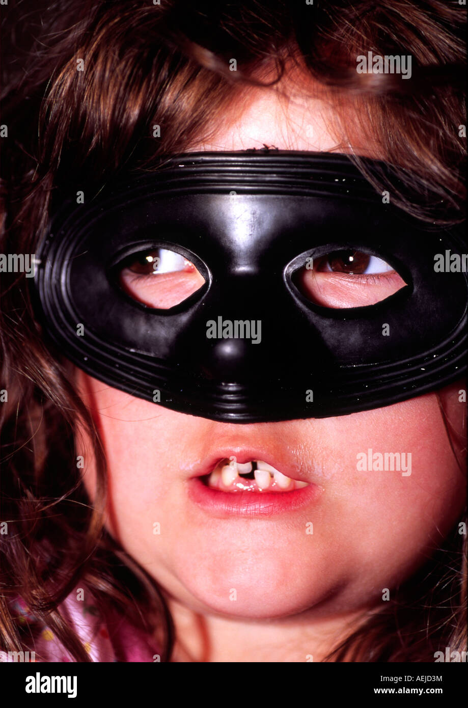 a girl in a mask Stock Photo - Alamy