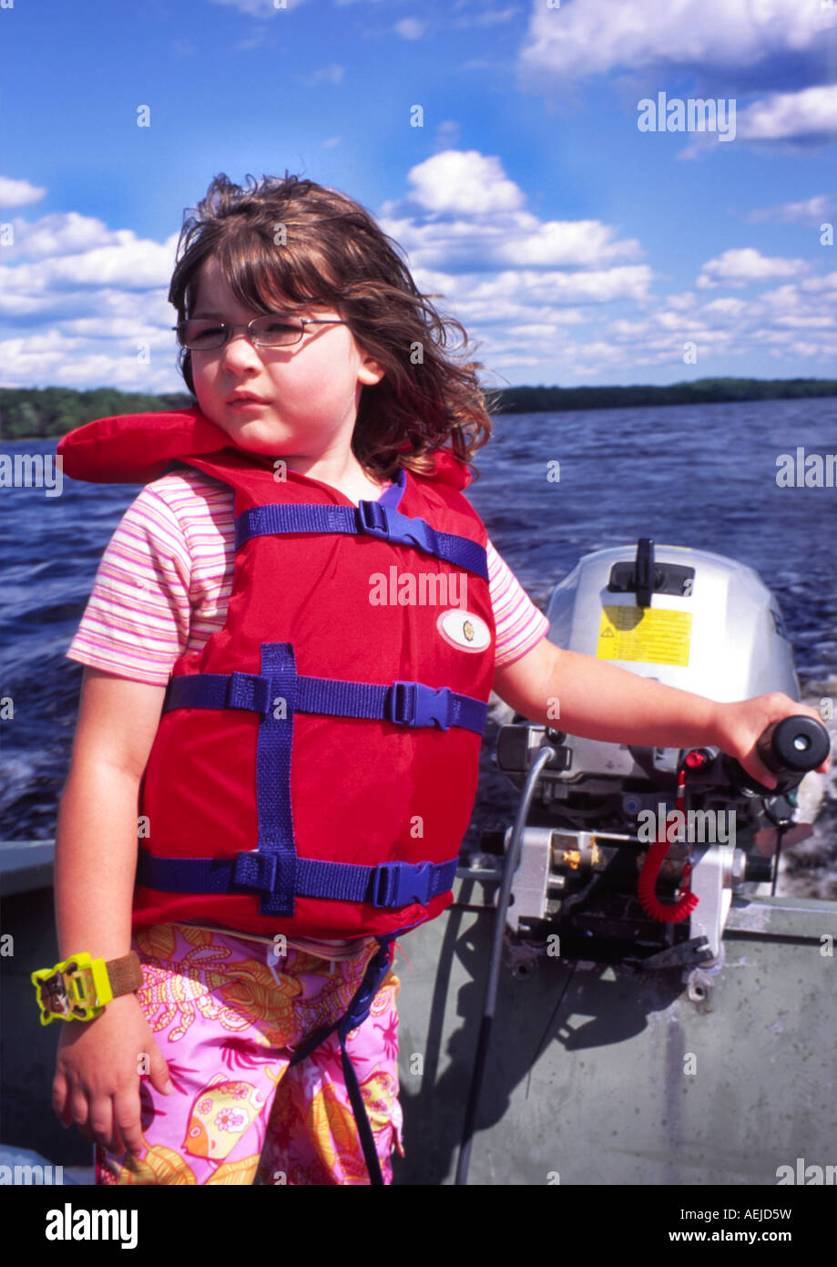 Kid girl steering boat hi-res stock photography and images - Alamy