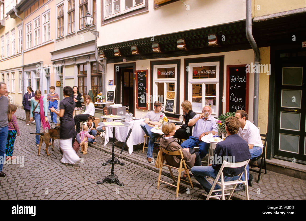 Germany, Thuringia, Erfurt,People sitting outside of bar Stock Photo ...