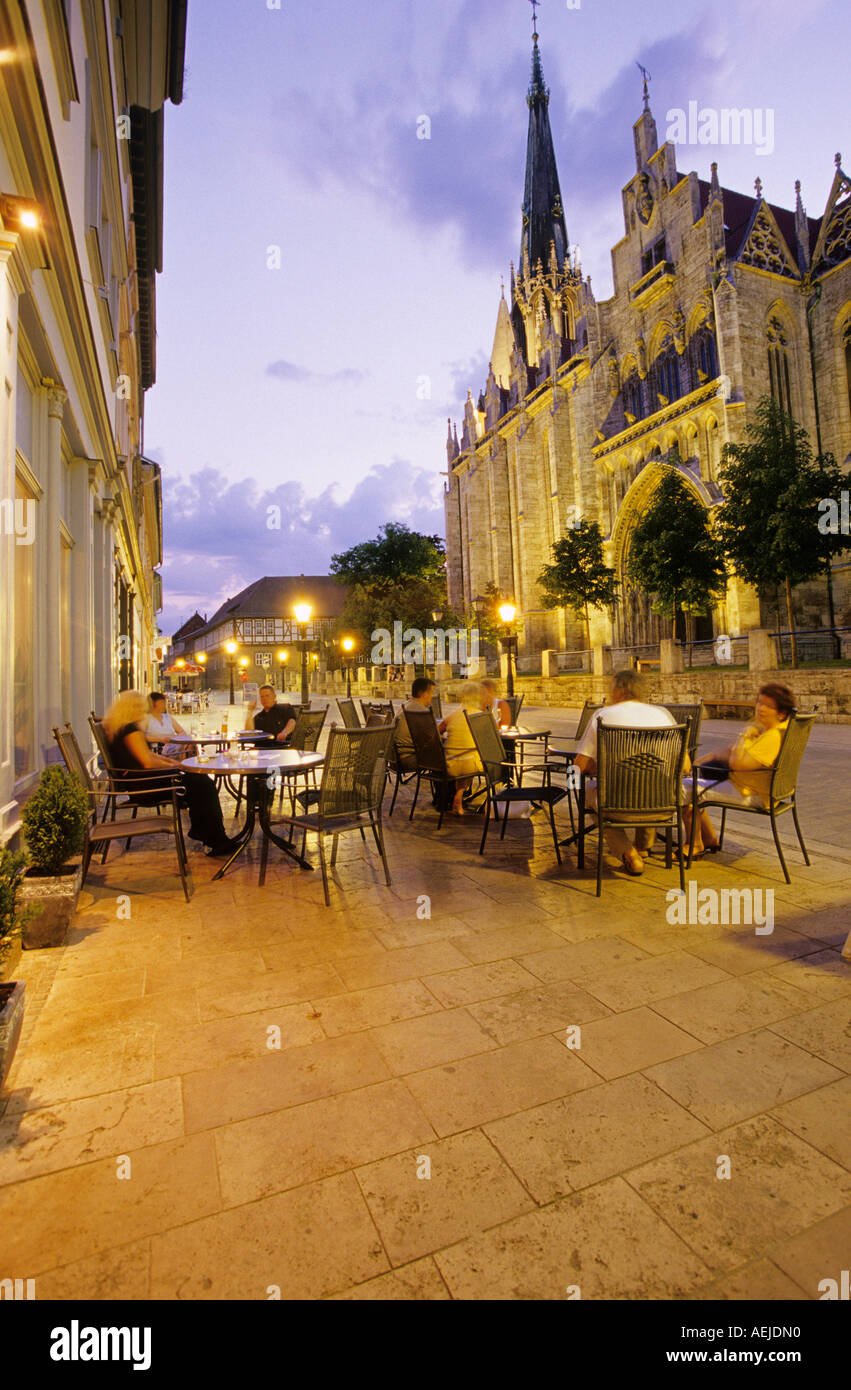 People sitting outside cafe Stock Photo - Alamy
