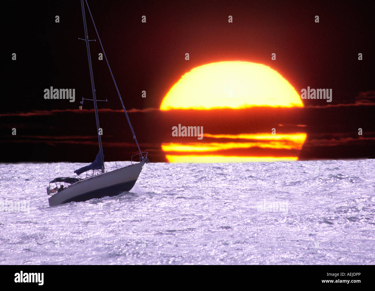 Sailboat sunset in ocean hi-res stock photography and images - Alamy