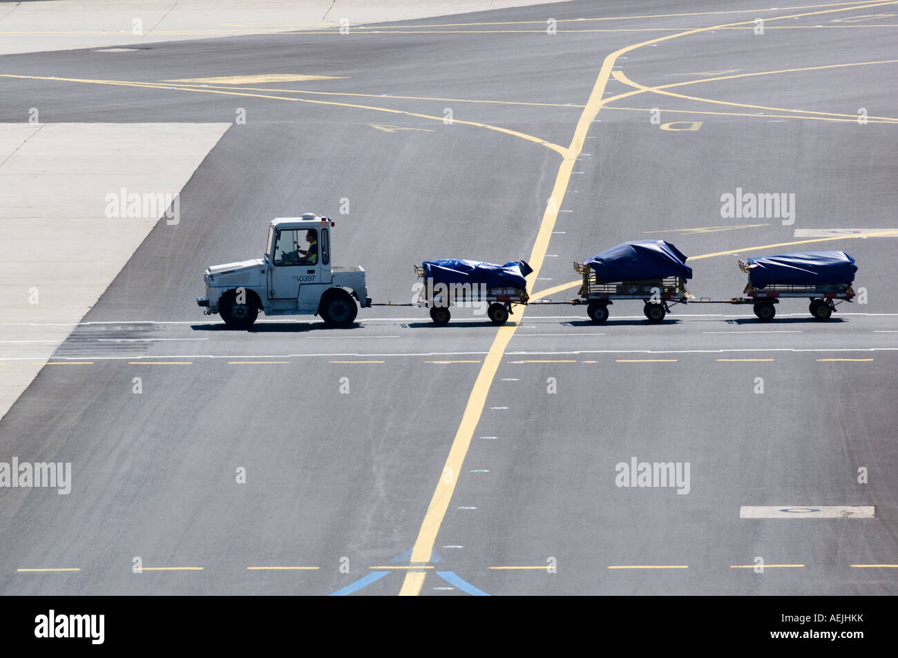 Luggage transporter, Frankfurt Airport, Hesse Germany Stock Photo - Alamy