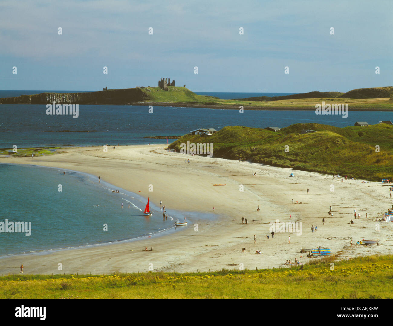 Dunstanburgh Castle and Embleton Bay seen from Low Newton ...