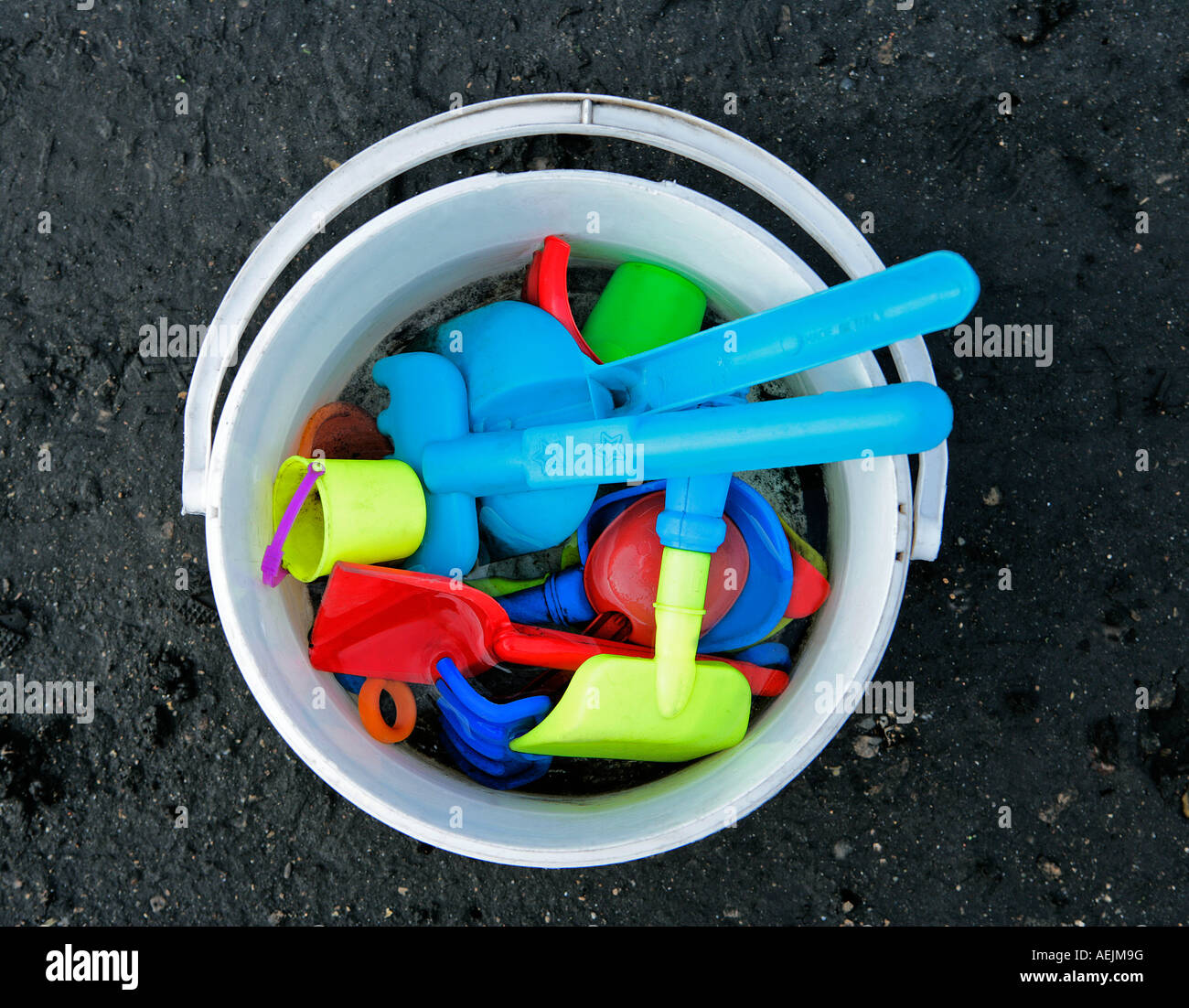 Little toy bucket with shovel and baking dishes Stock Photo - Alamy