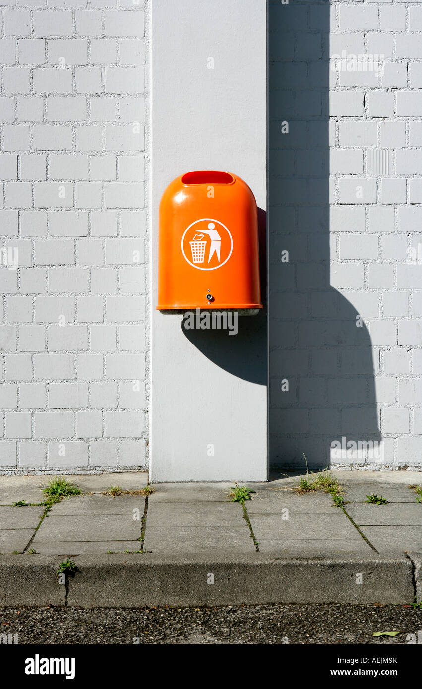 Dustbin at a house wall Stock Photo - Alamy