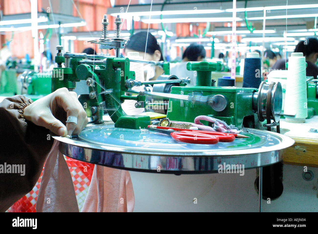 Sweatshop china hi-res stock photography and images - Alamy