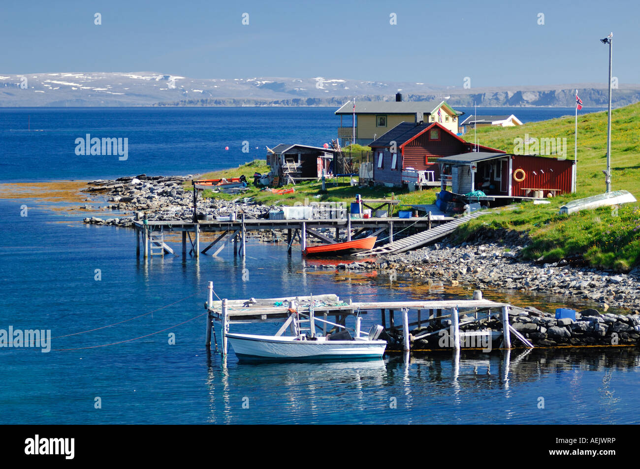 Fisher hut at the fjord on the way to the North Cape, Northern Norway ...