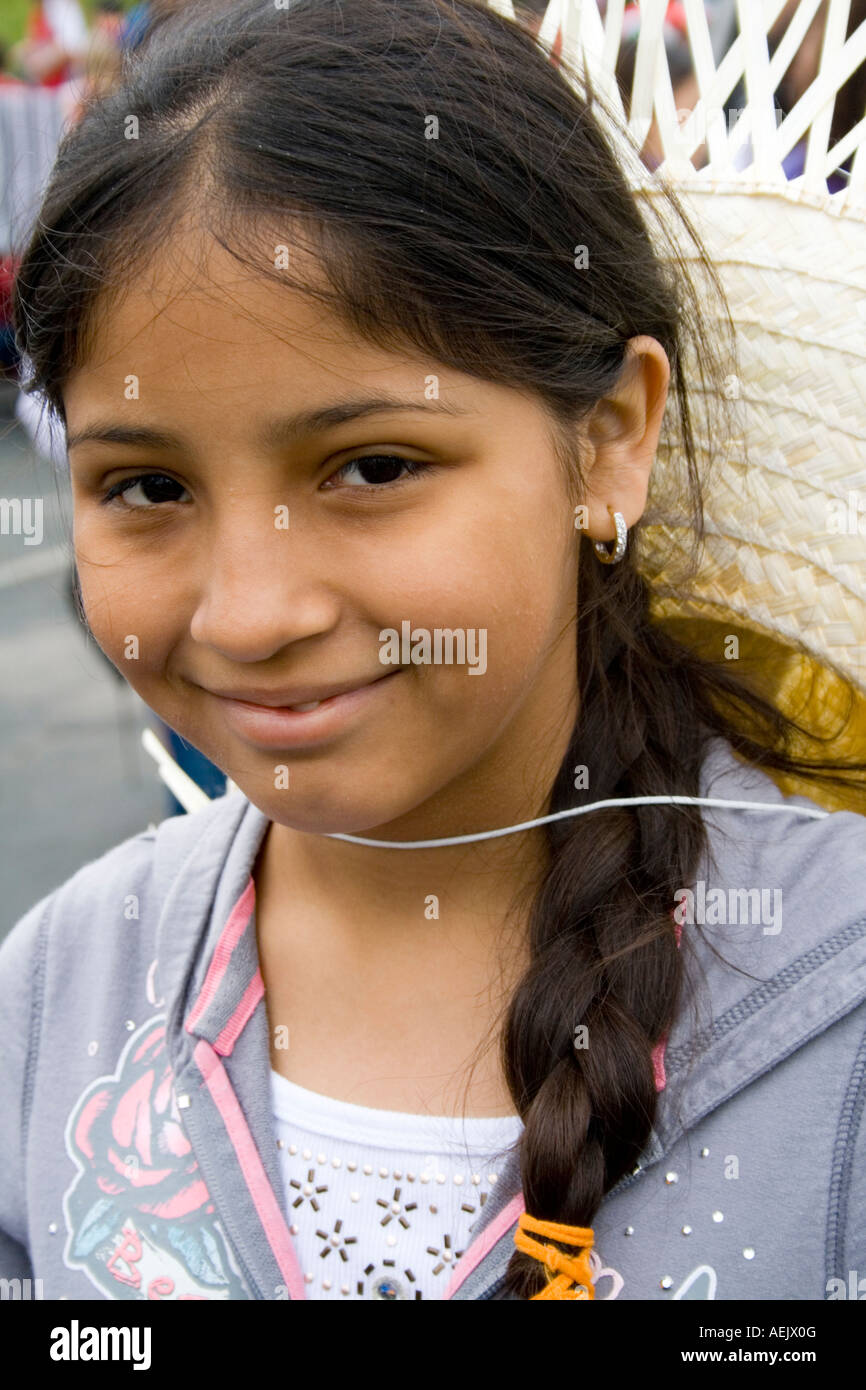 Happy young Chicana girl age 11 wearing Mexican sombrero. Cinco de ...