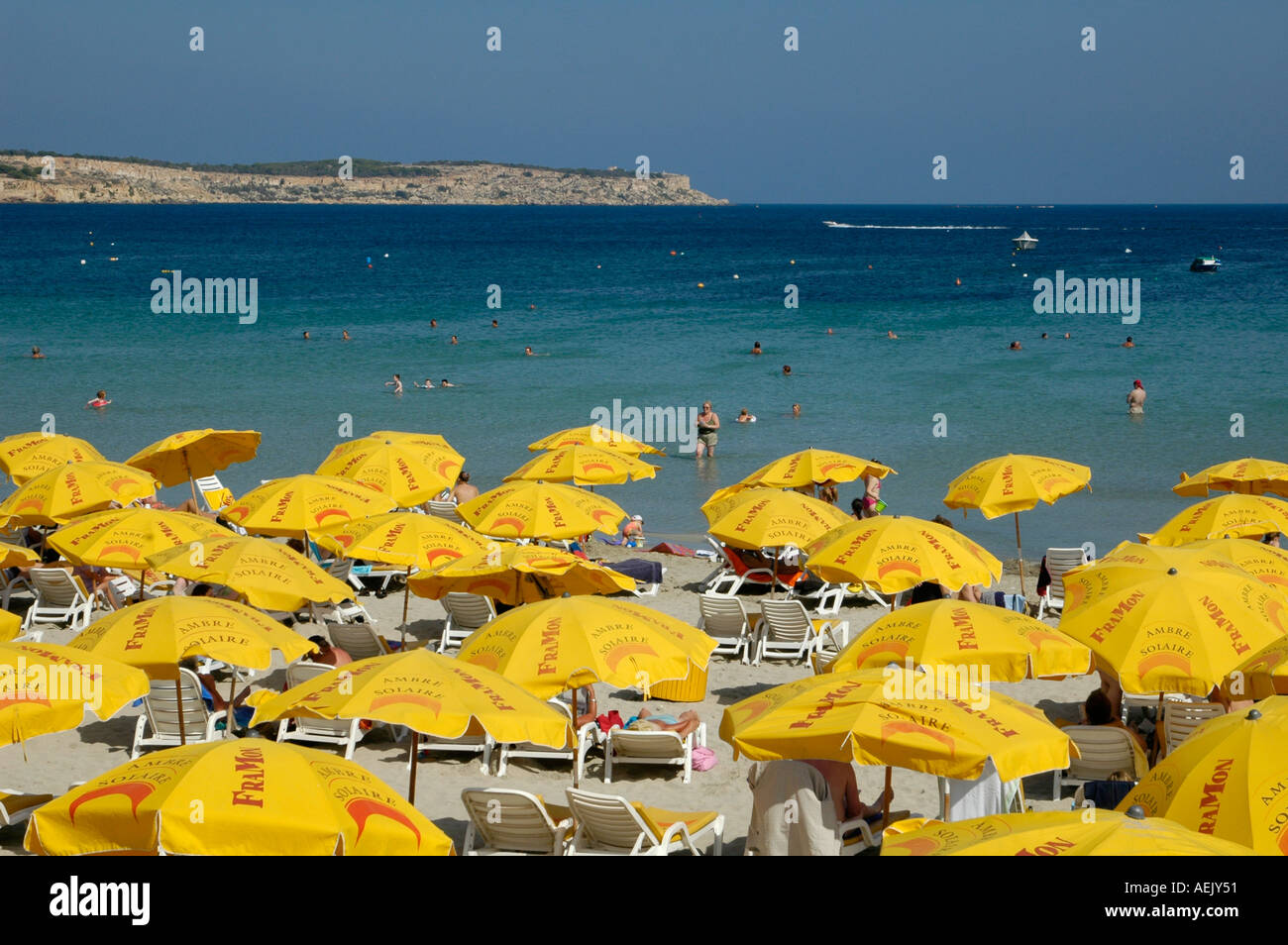 Crowded beach at Mellieha Bay also known as Ghadira Bay at the seacoast ...