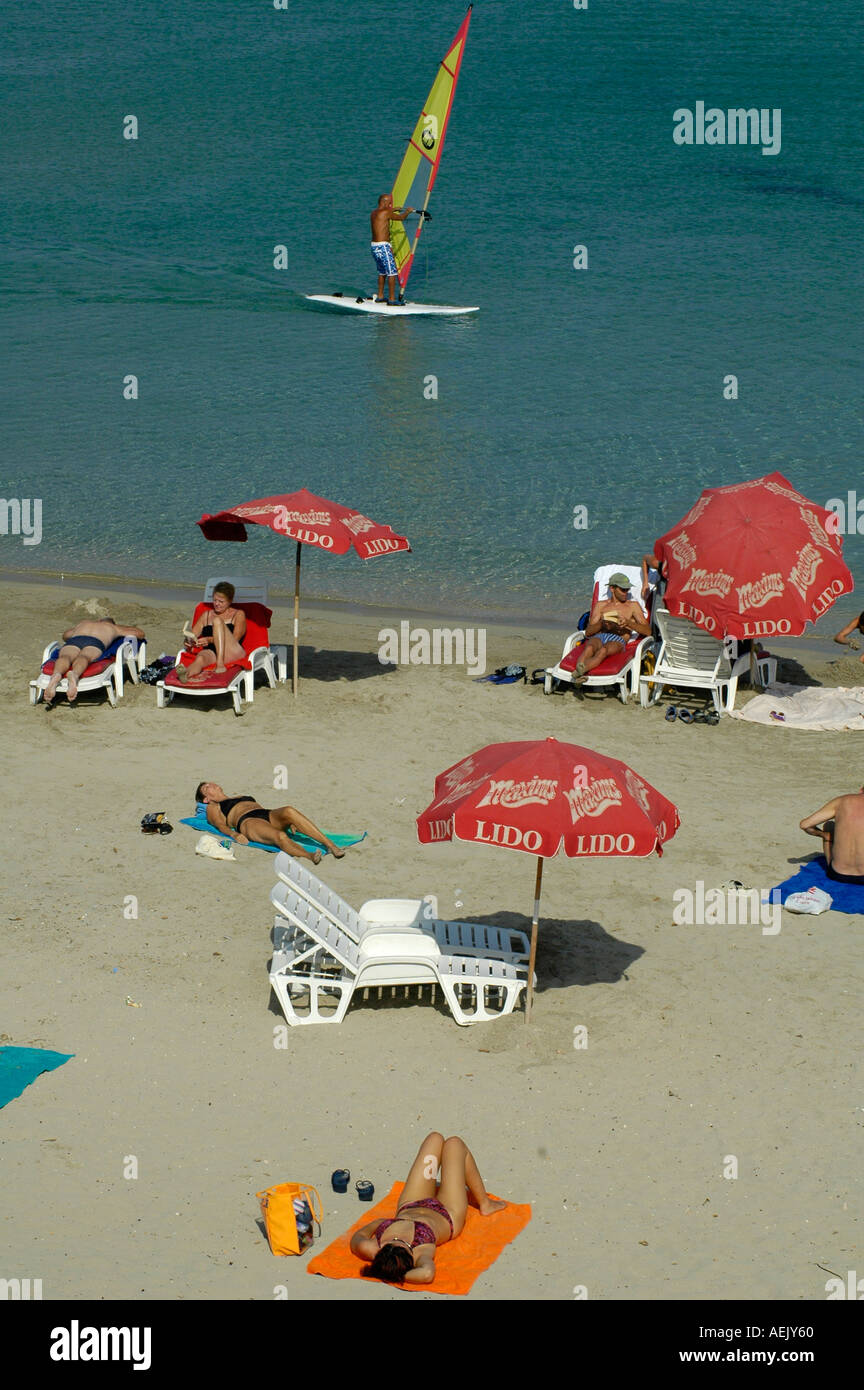 People sunbathing in Mellieha bay also known as Ghadira Bay at the ...