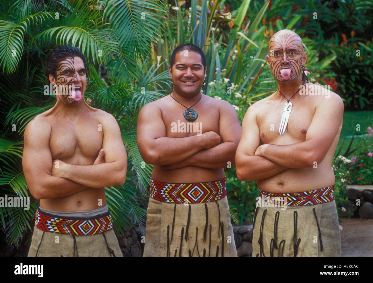 Maori warriors with tongues out at the Polynesian Cultural Center Stock ...
