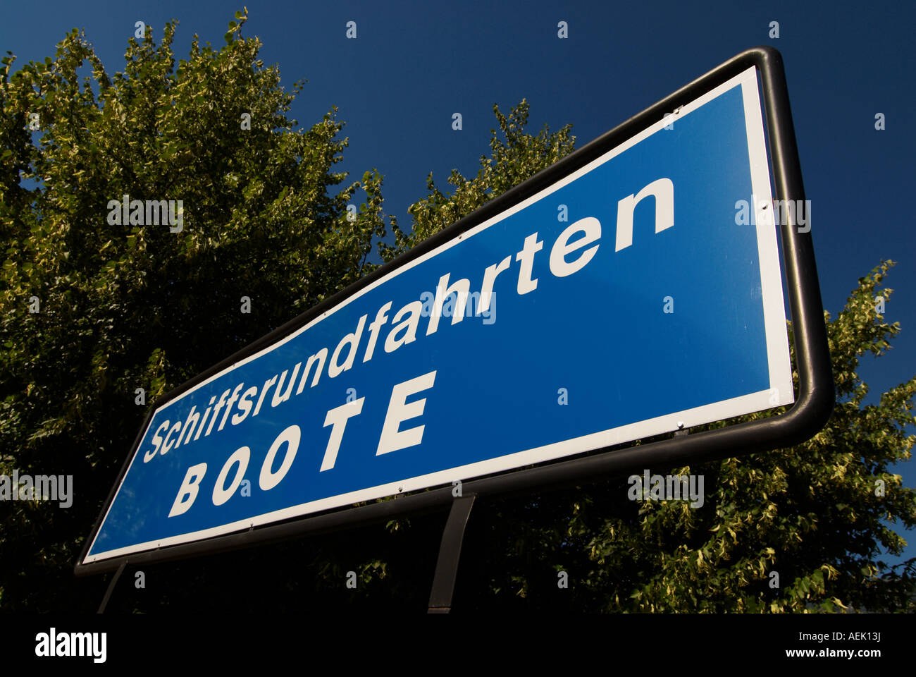 Sign signs signboard signboards roundtrip boat trip Stock Photo - Alamy