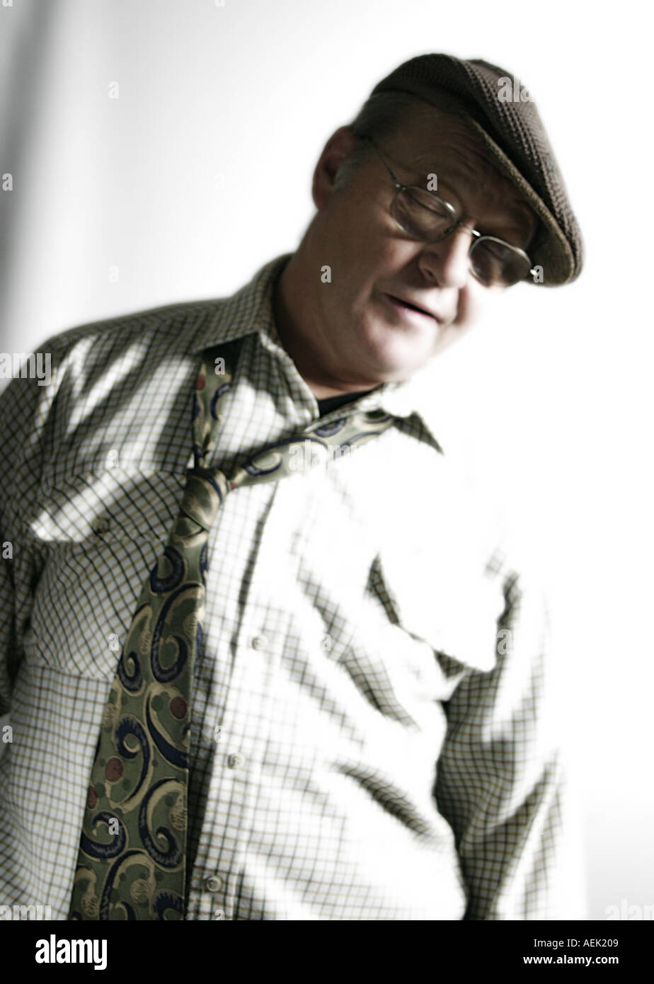 Man in traditional northern English Cap looking the worse for wear ...