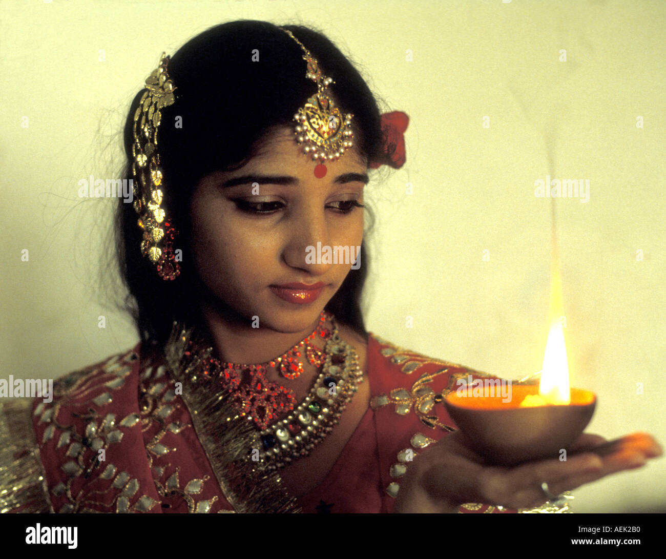 Indian girl with a lamp hi-res stock photography and images - Alamy