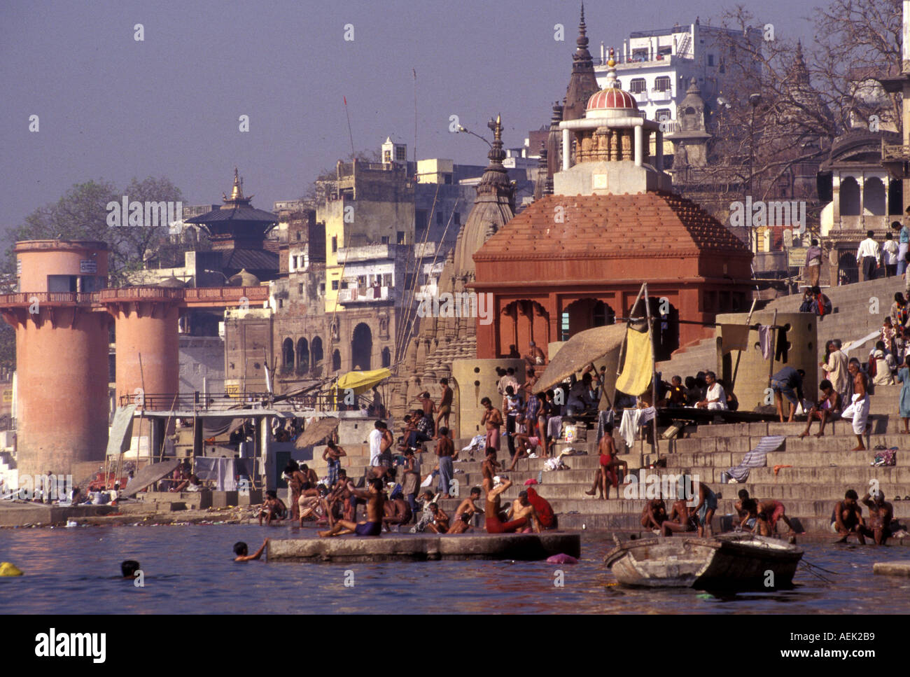 Busy scene at Varanasi, sacred cremation site on the Ganga river in ...