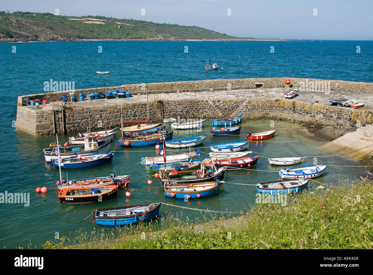 Coverack fishing boats & harbour near South West Coast Path high tide ...