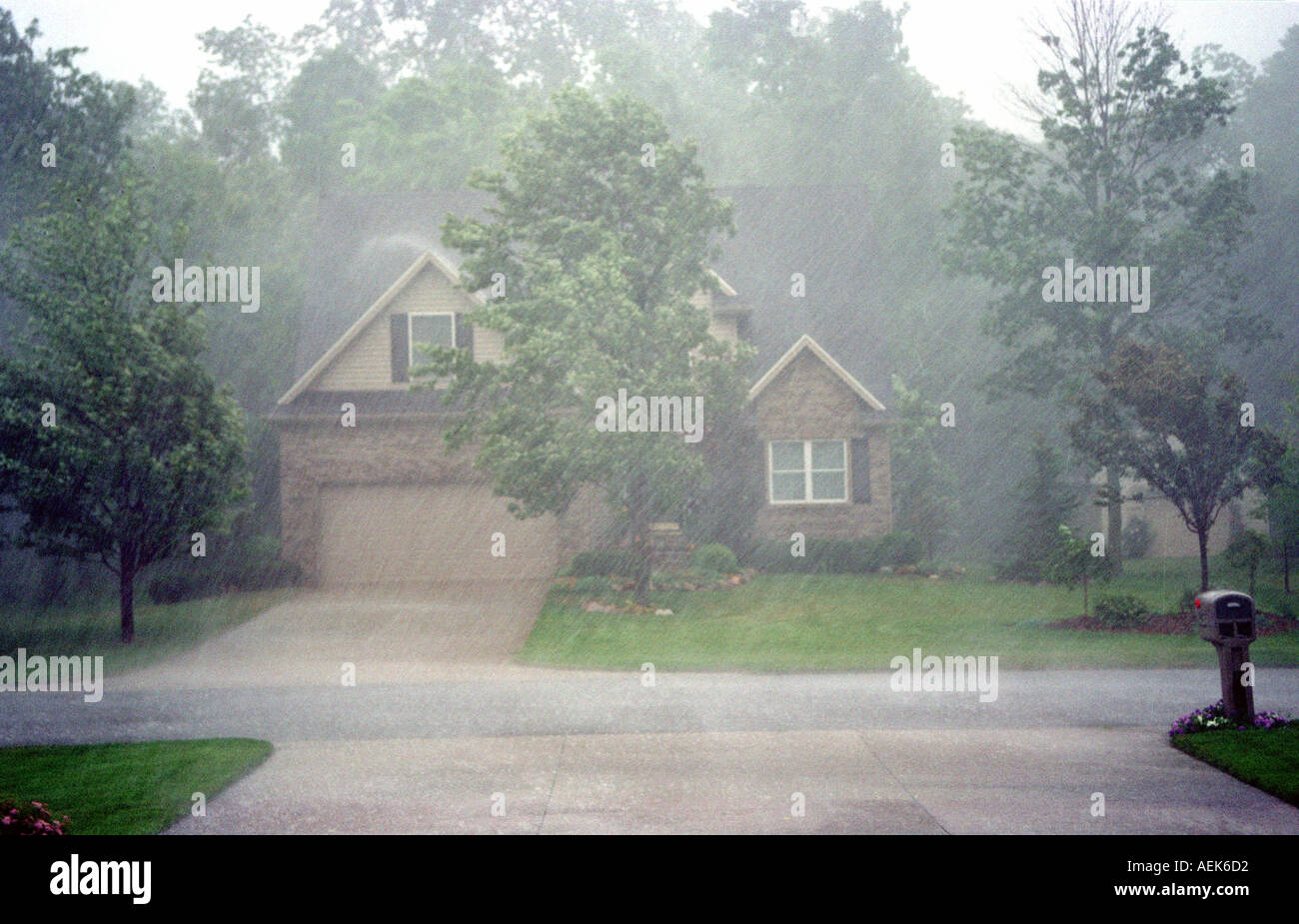 Heavy rainstorm in a residential neighborhood Stock Photo - Alamy