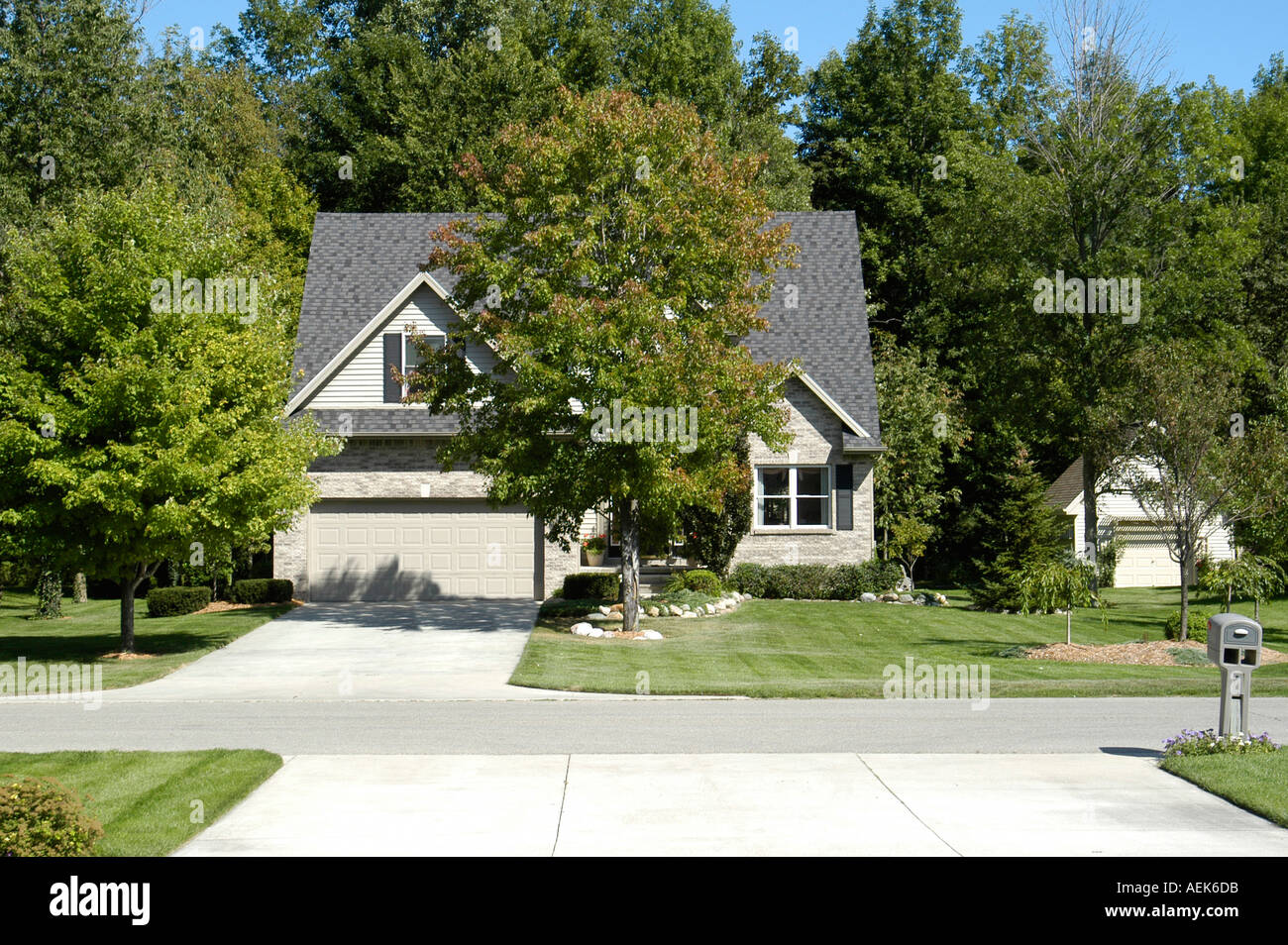 Middle class home in a quiet neighborhood Stock Photo - Alamy