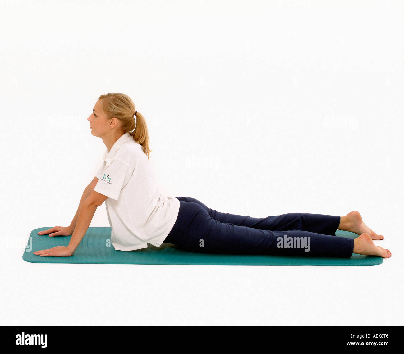 Woman stretching twist exercise Cut Out Stock Images & Pictures - Alamy