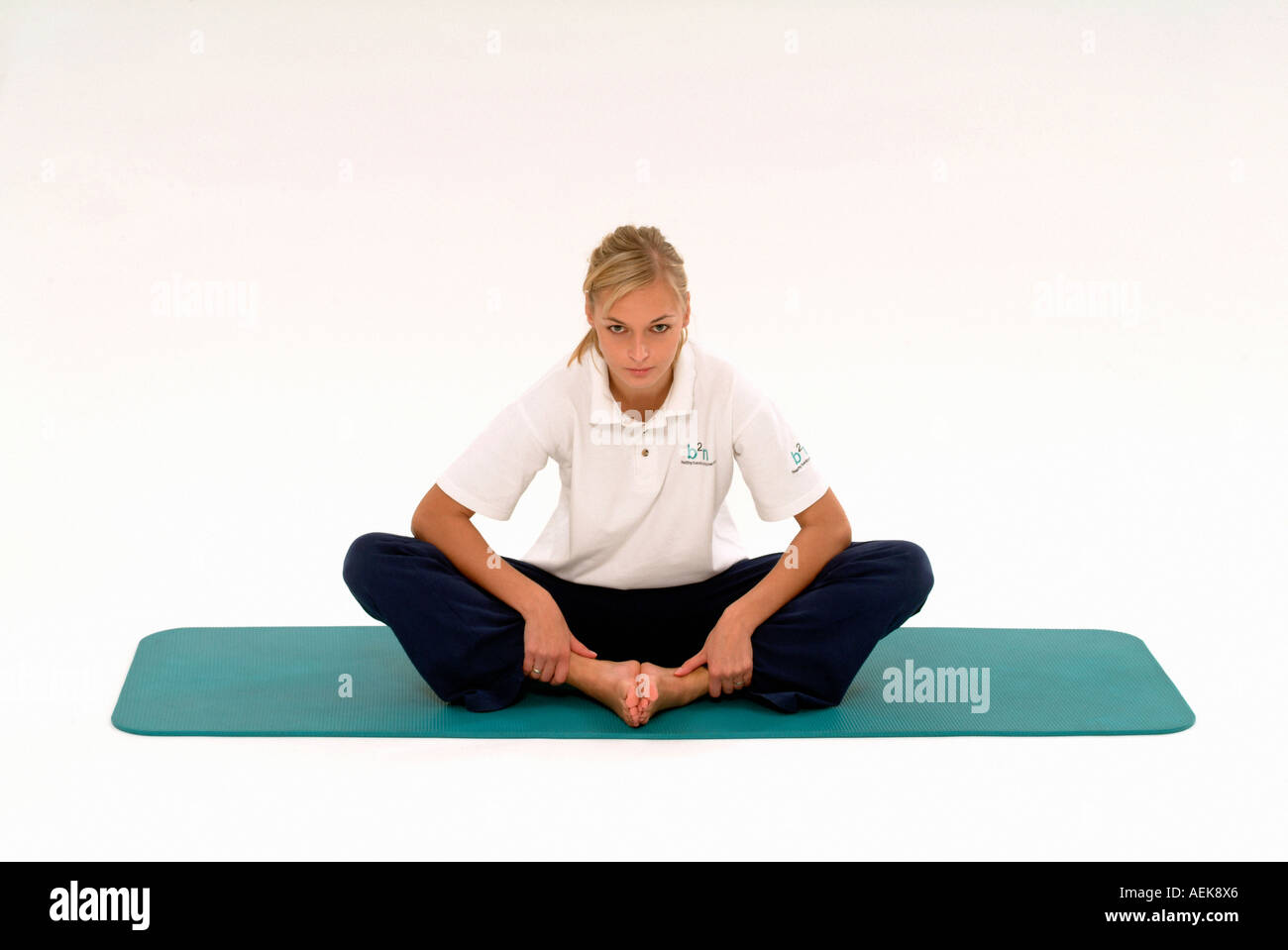 Woman kneeling leaning back exercise hi-res stock photography and ...