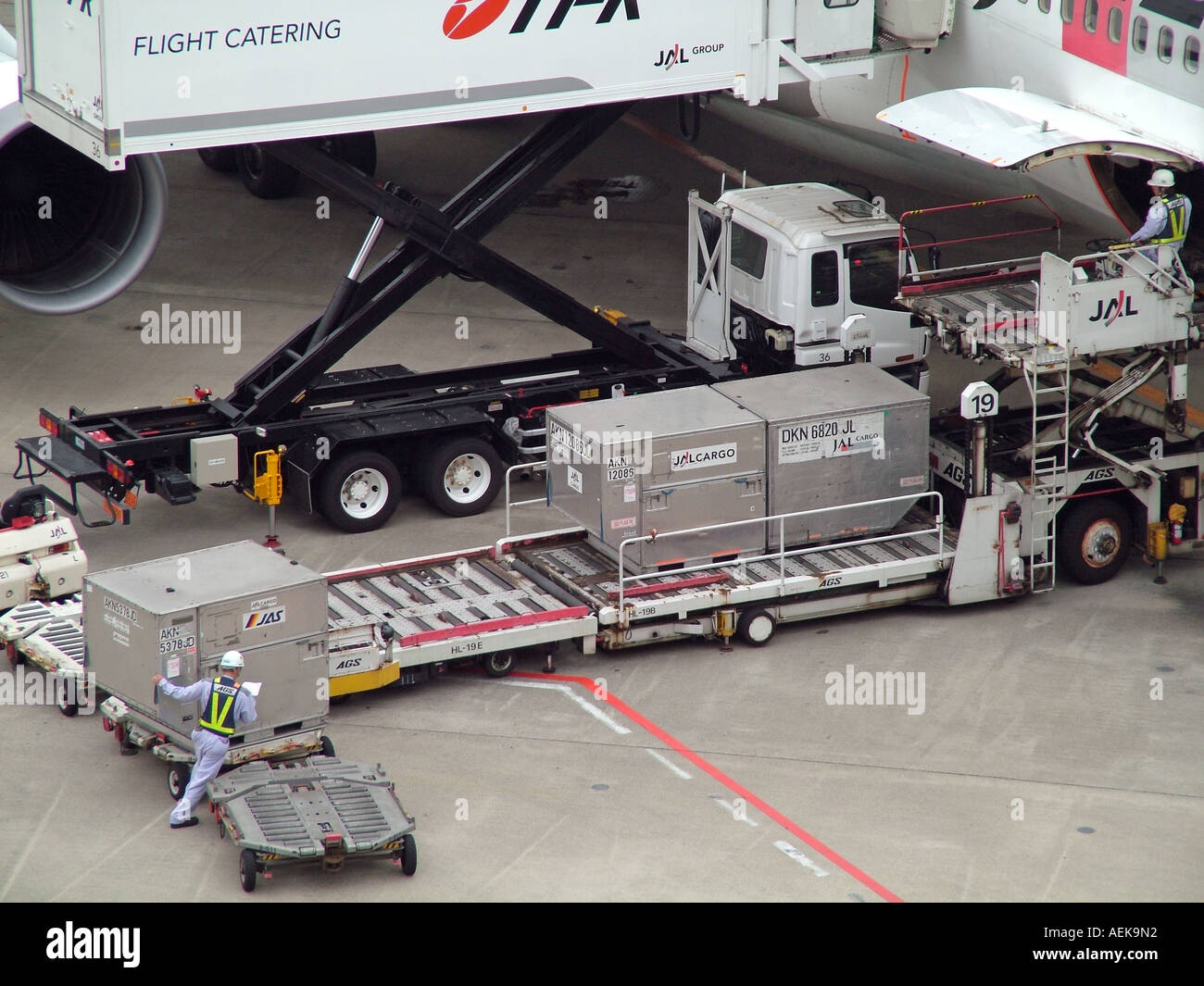 Cargo loading on a 747 aircraft of JAL. Norita airport Tokyo Japan ...
