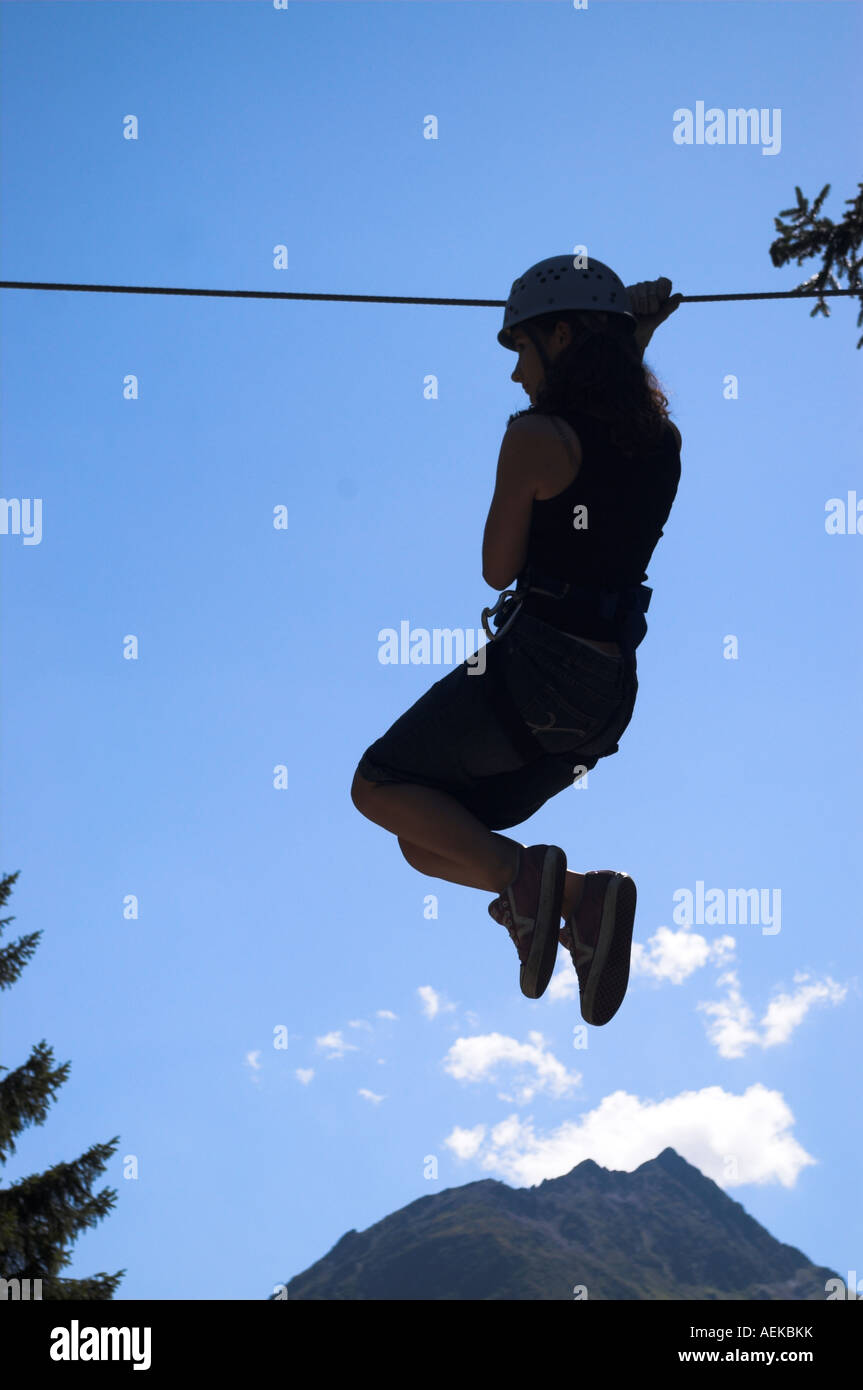 Silhouette of Girl on Zip Wire Stock Photo - Alamy