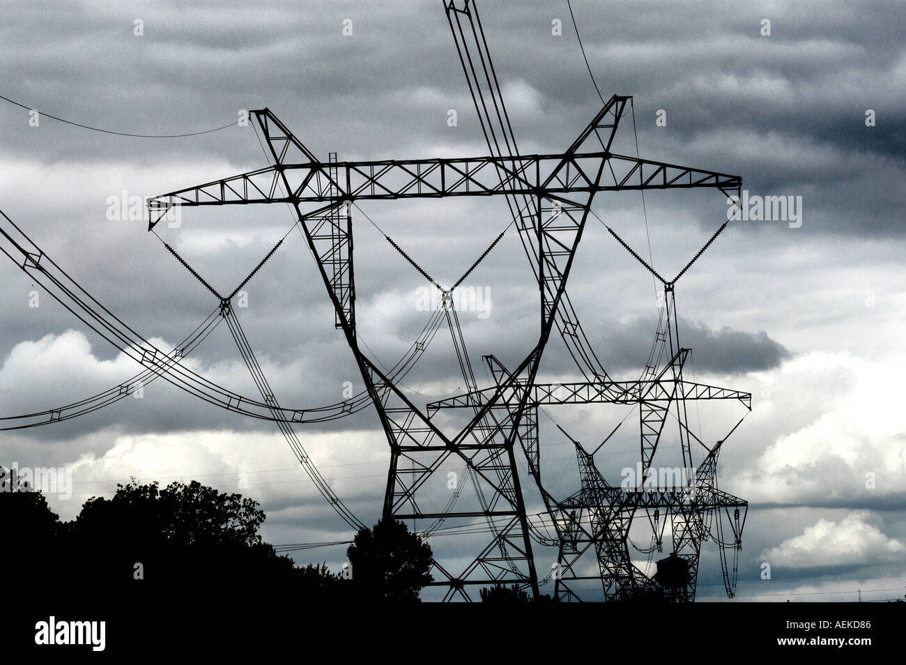 Electrical Power lines with a backdrop of storm clouds Stock Photo - Alamy