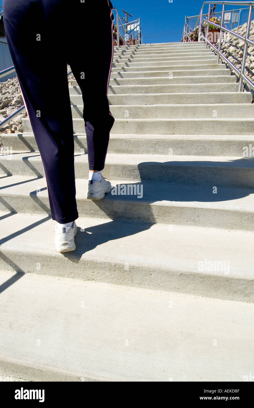 Concept of climbing to the top one step at a time Stock Photo - Alamy