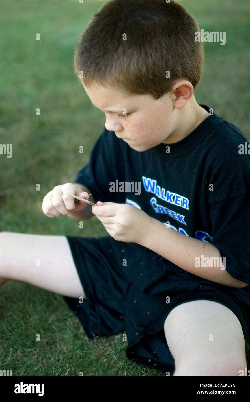 Boy pocket knife hi-res stock photography and images - Alamy